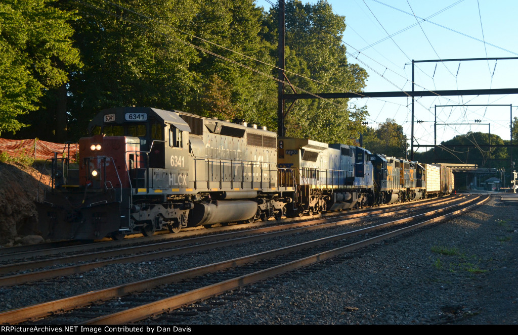 HLCX SD40-2 6341 "Southern Pacific" leads Q300-23
